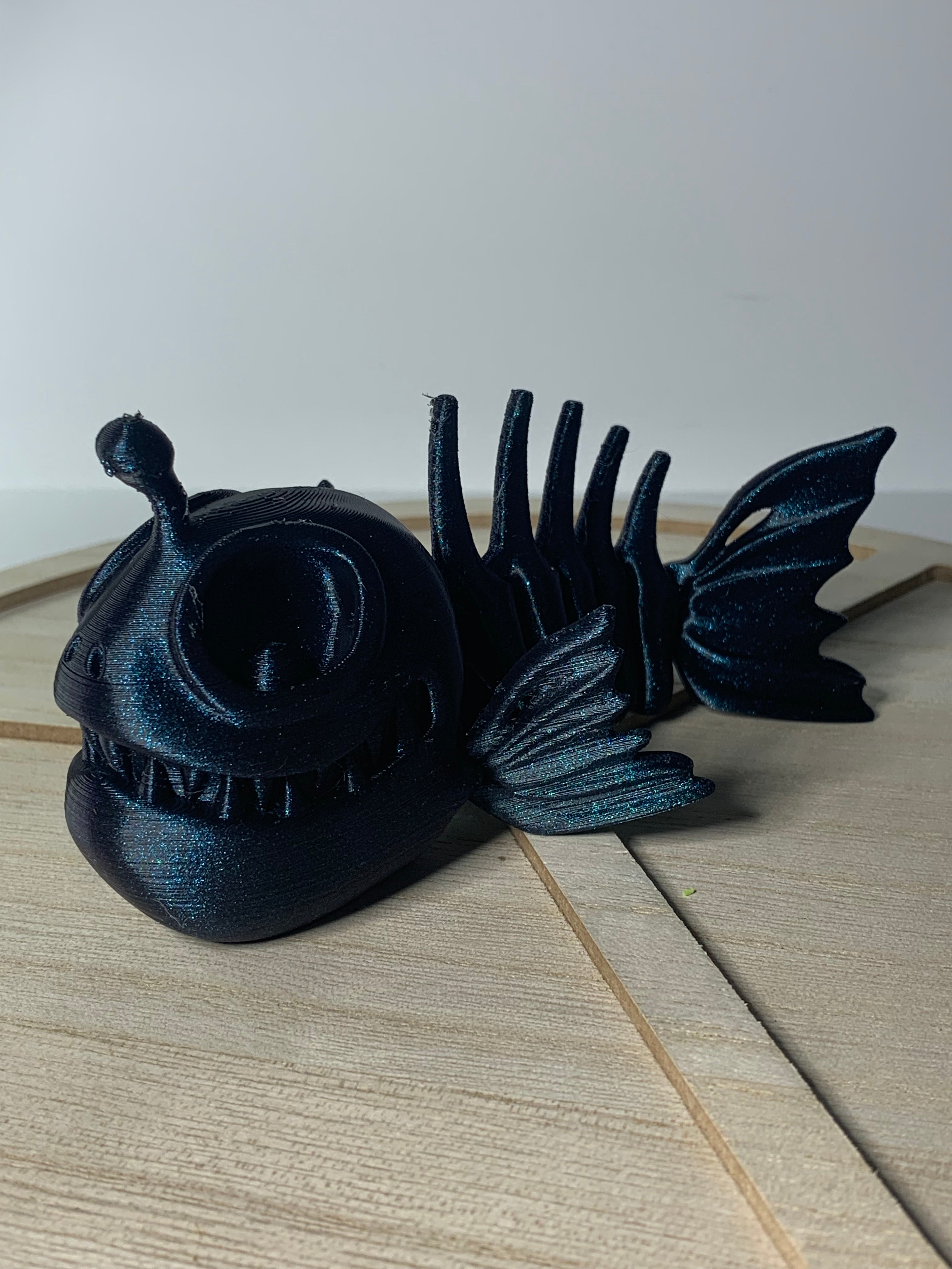 Articulating Creepy fish – Restored Faith Jewelry